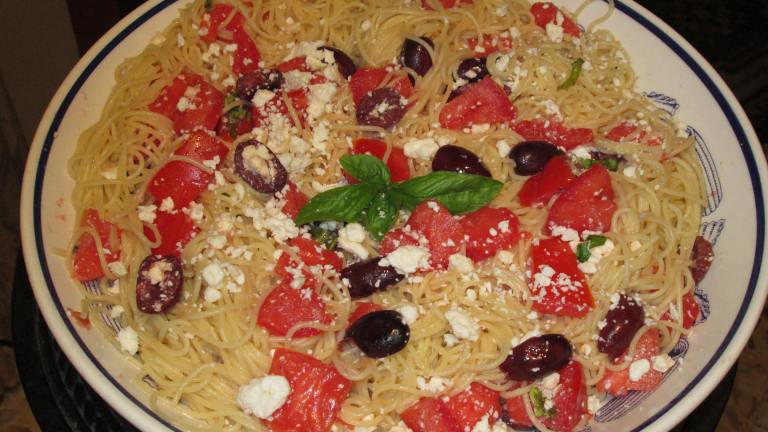 Spaghetti With Tomatoes, Black Olives, Garlic, and Feta Cheese Recipe ...